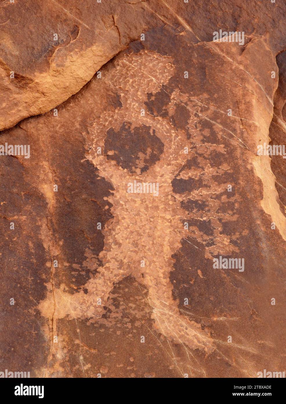 an native american petroglyph depicting a kokopelli flute player in ...