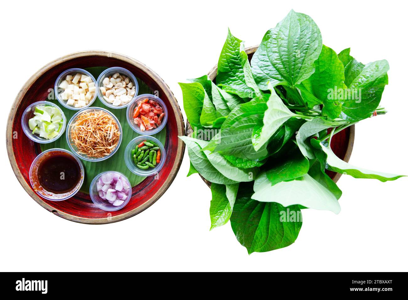Die cut of A royal leaf wrap appetizer, call Miang kham on white ...