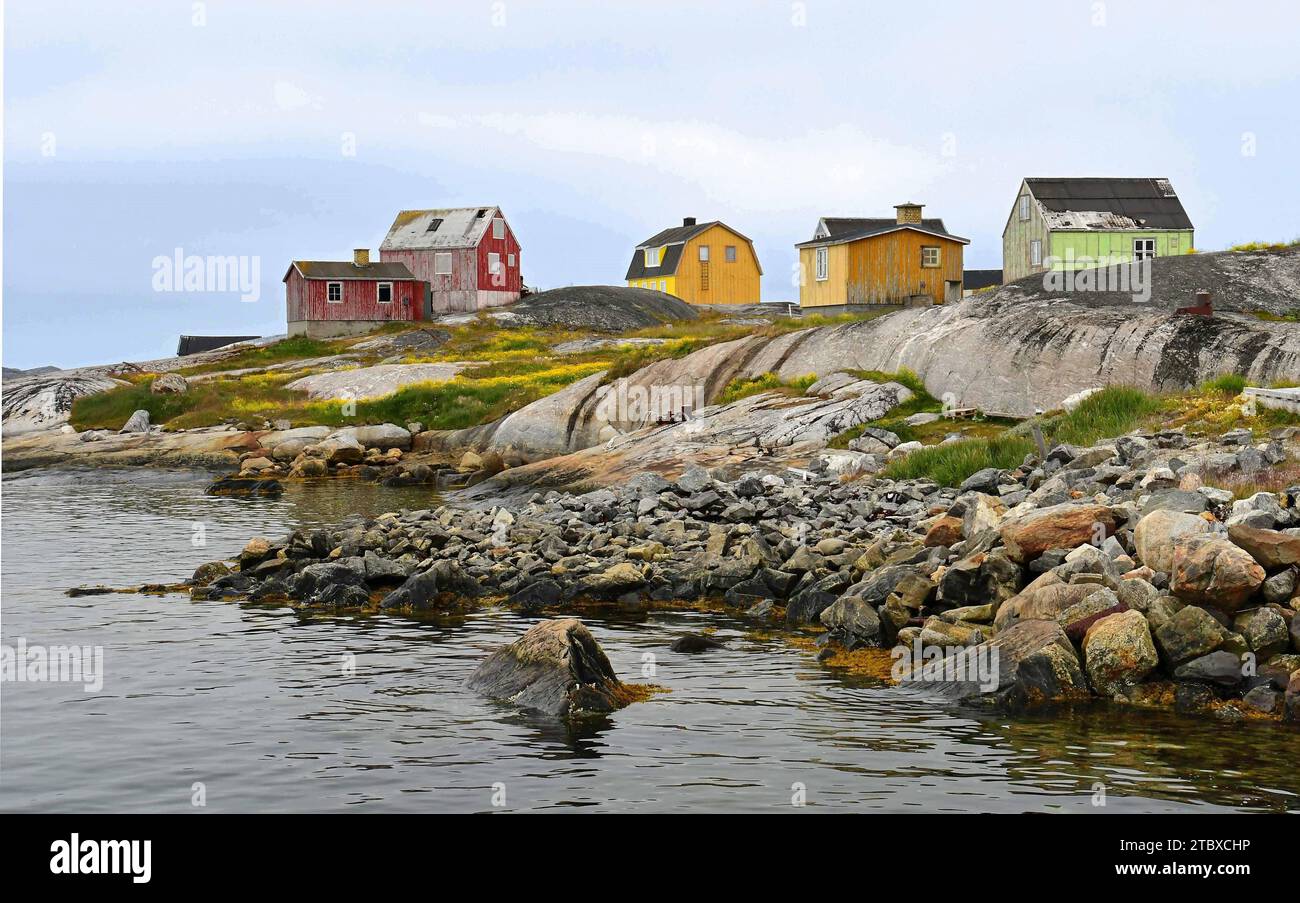 colorful houses on the rocky shore of the remote fishing village of ...