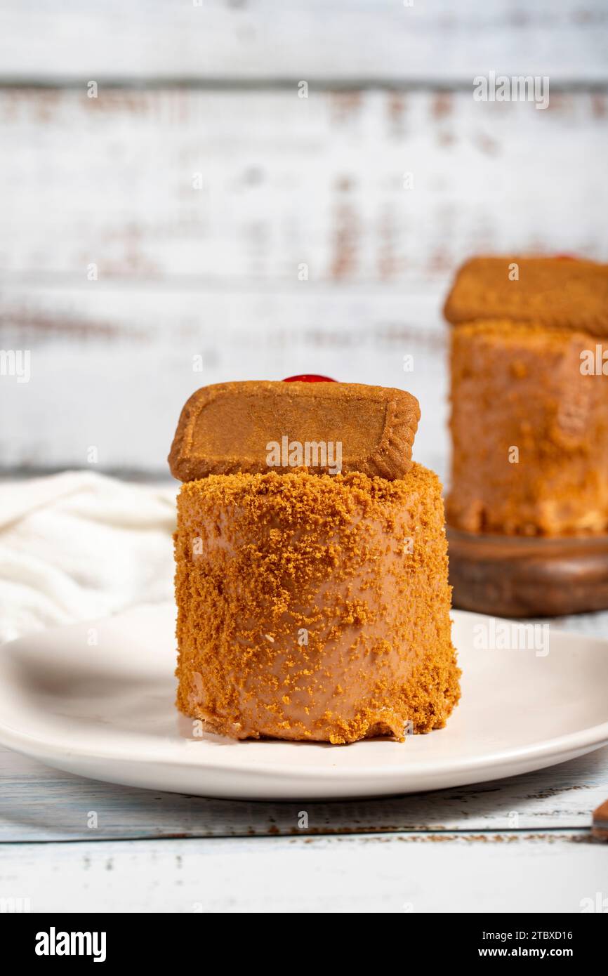 Biscuit cake. Delicious cream cake on a white background. Cake with ...