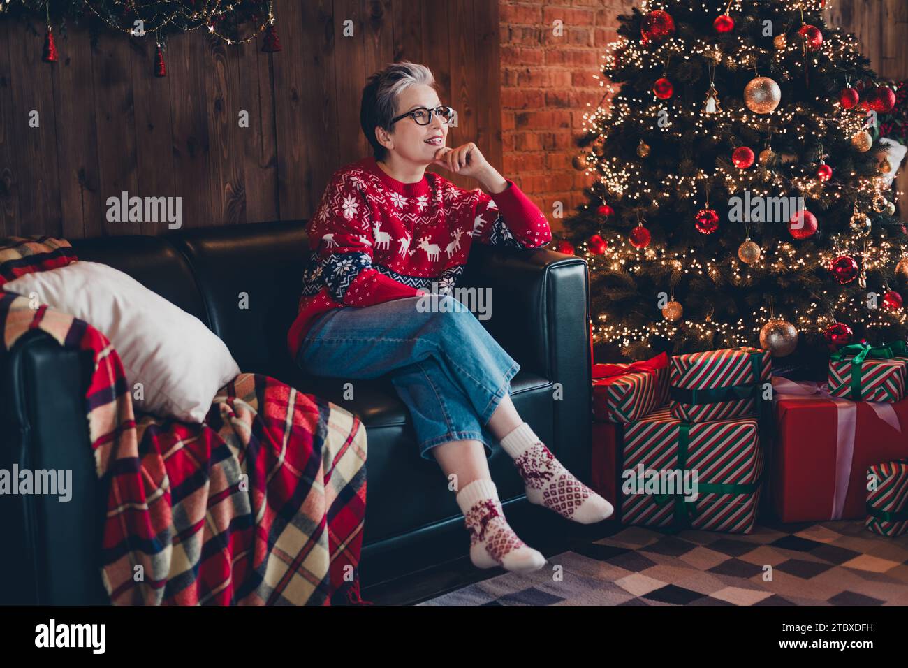 Full size photo of peaceful minded grandmother sitting comfy sofa ...