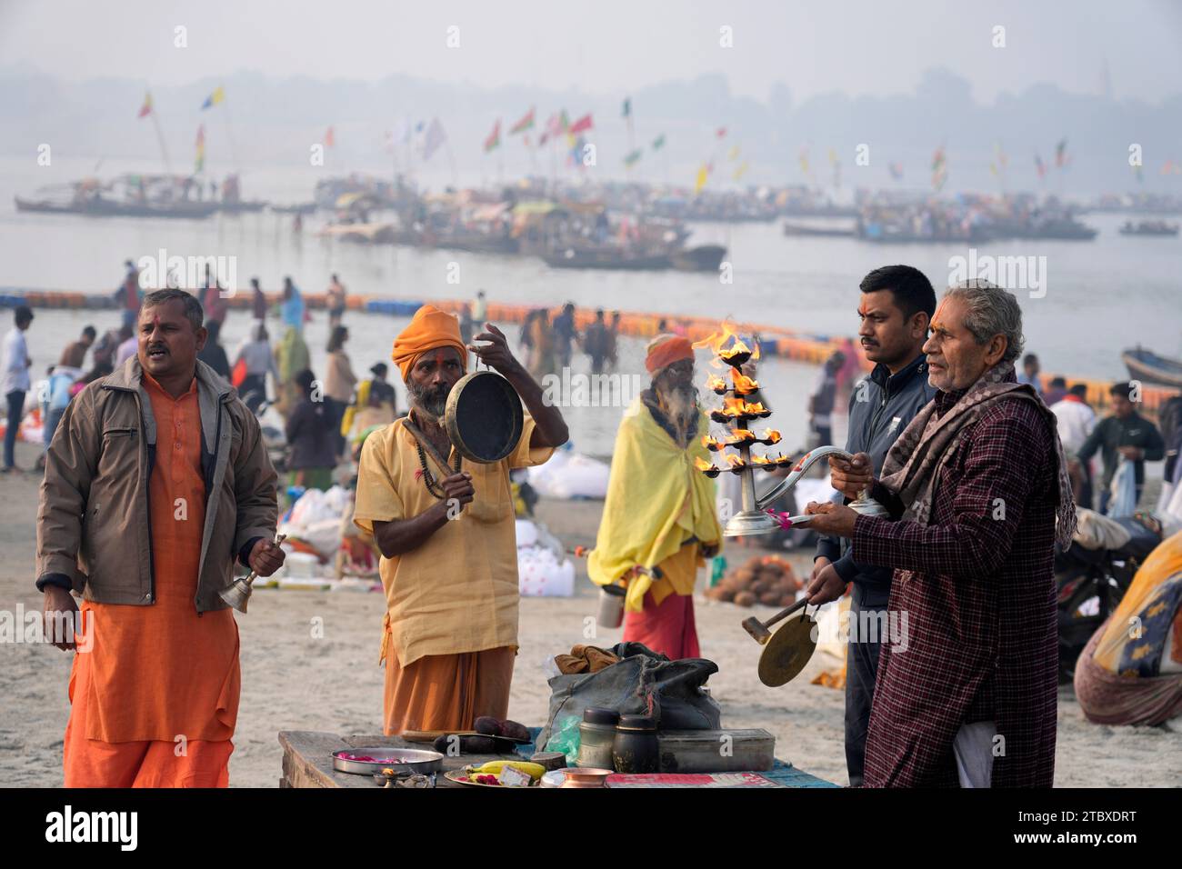 Hindu devotees perform "Aarti," a ritual involving rotating a ...