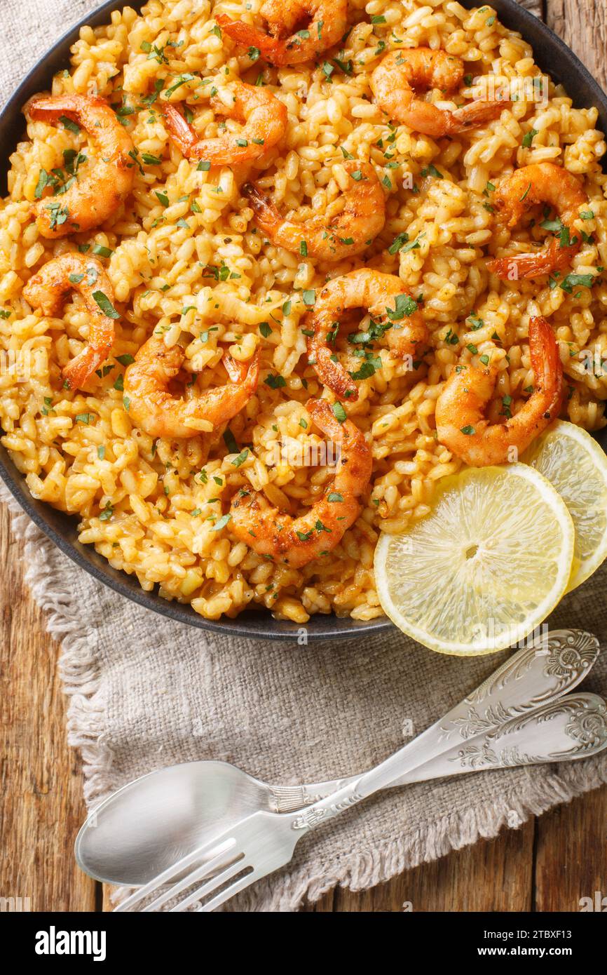 Creamy Garlic Shrimp Risotto or Risotto ai Gamberi closeup on the plate ...