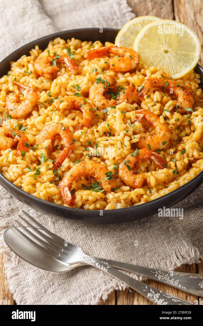 Italian Risotto ai Gamberi or Shrimp Risotto a closeup on the plate on ...