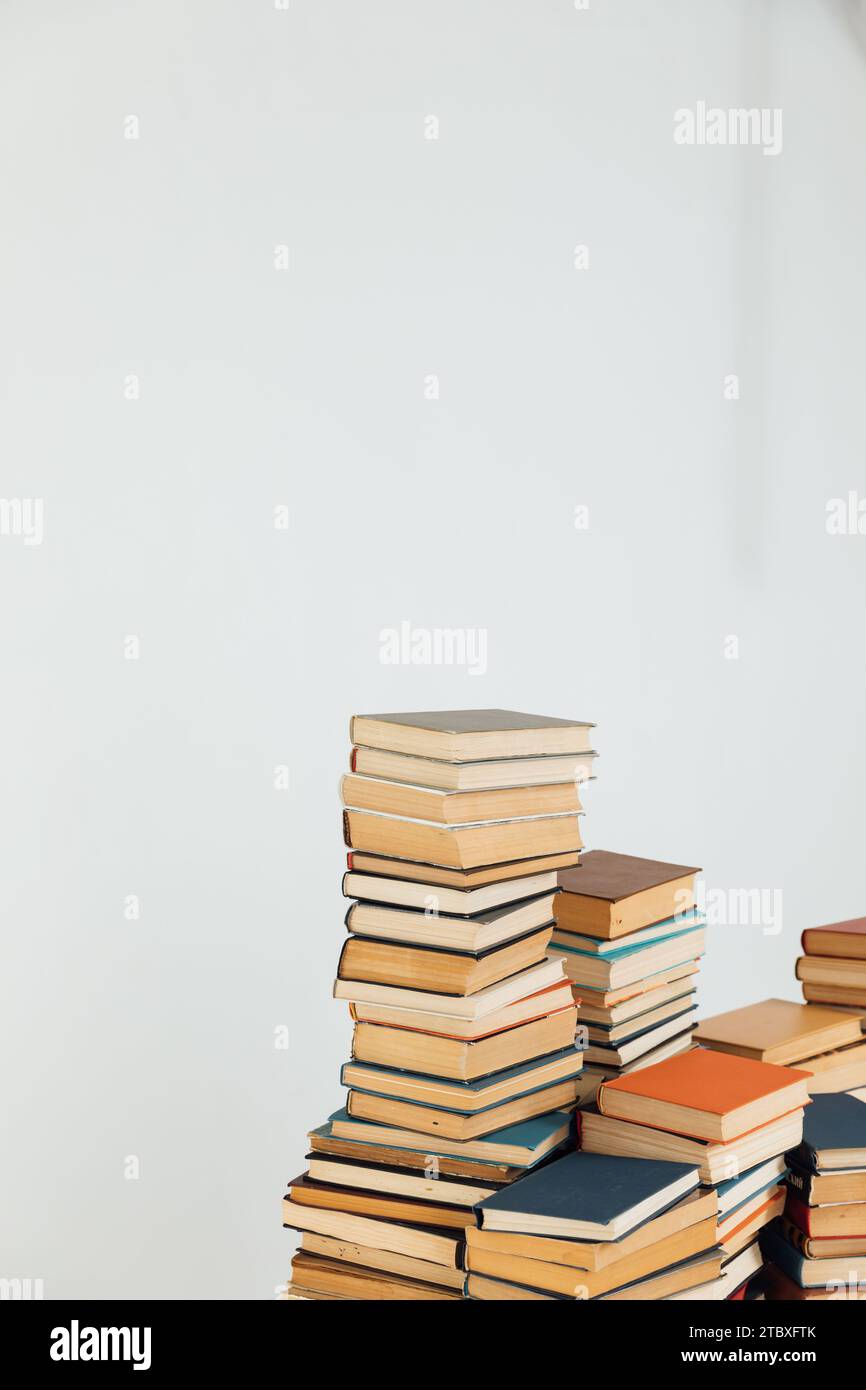 Stacks of old books in study library on white background Stock Photo ...