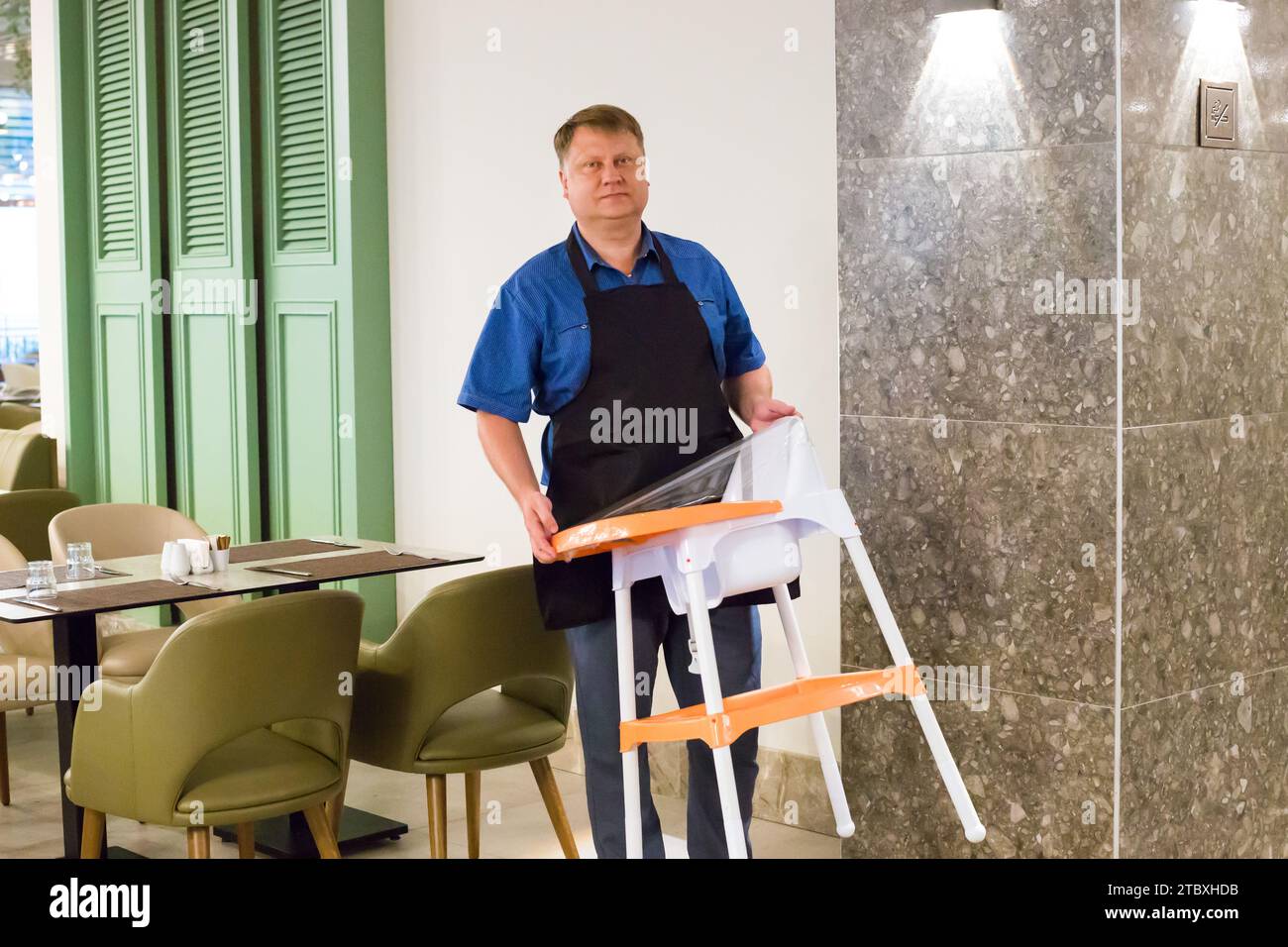 Children restaurant waiter hi-res stock photography and images - Alamy