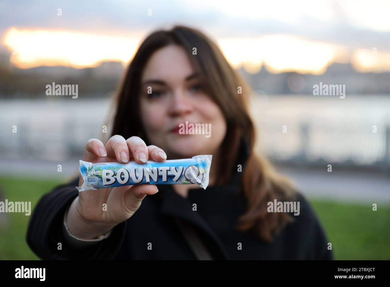 Mars bars eating woman hi-res stock photography and images - Alamy