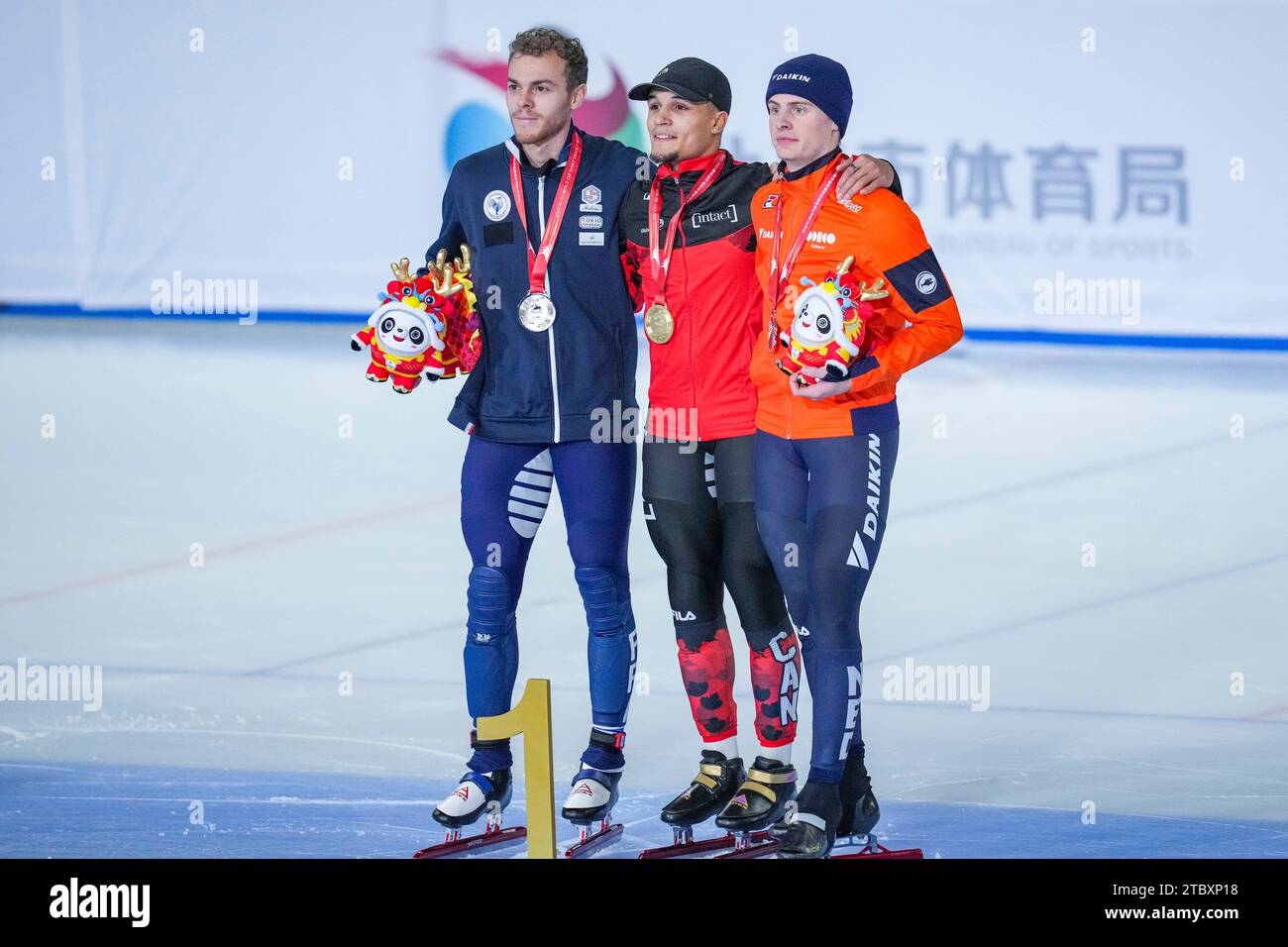 Beijing, China. 9th Dec, 2023. Gold medalist Jordan Pierre-Gilles (C ...