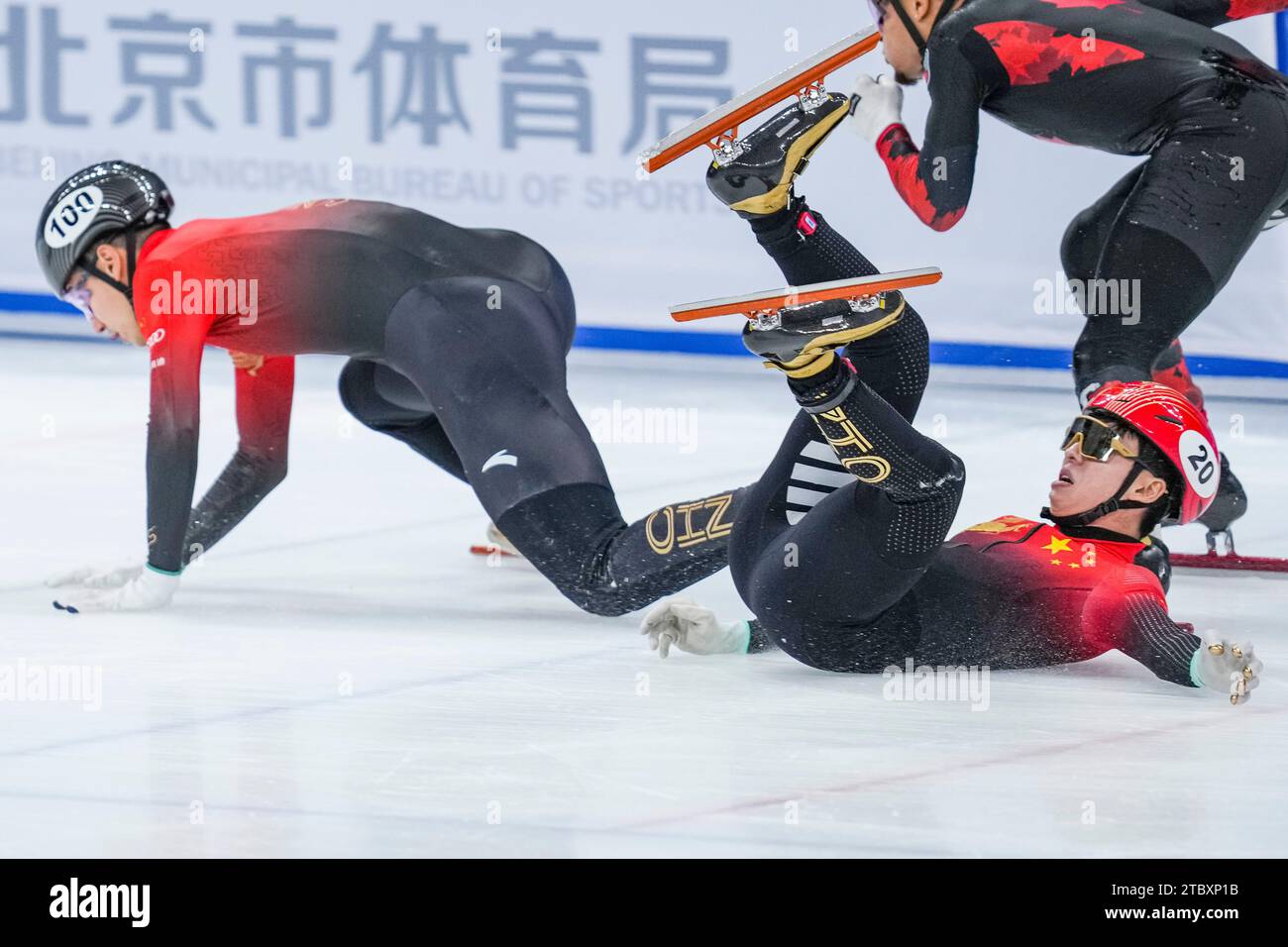 Beijing, China. 9th Dec, 2023. Lin Xiaojun (R) and Liu Shaoang (L) of China fall during the men ...