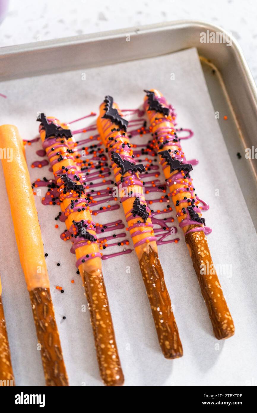 Halloween chocolate-covered pretzel rods Stock Photo - Alamy