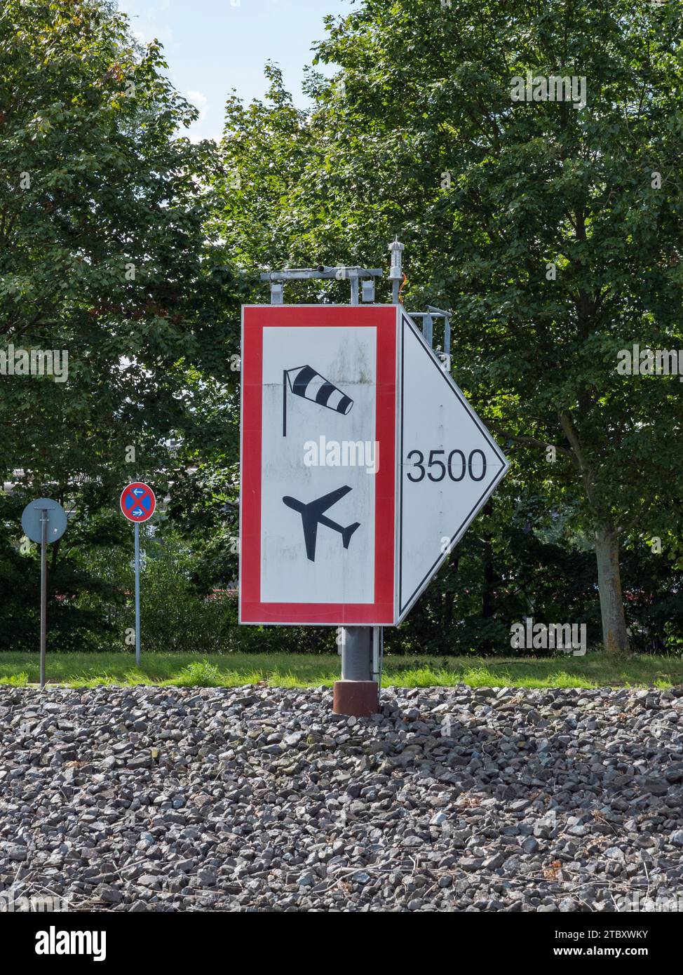 Riverside sign warning about the airport nearby (Hamburg-Finkenwerder ...
