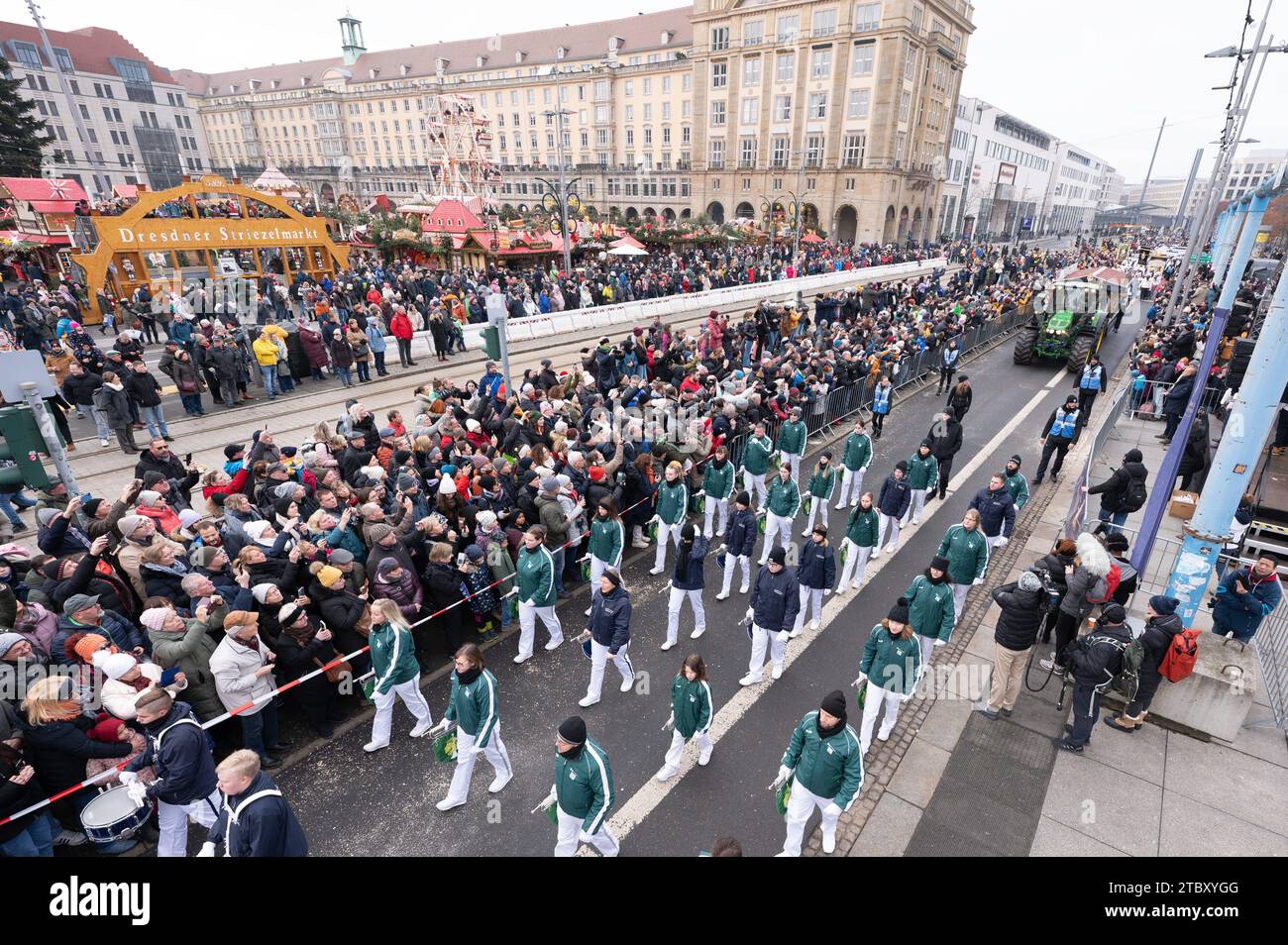 Dresden, Germany. 09th Dec, 2023. Participants in the Dresden Stollen Festival parade walk in ...