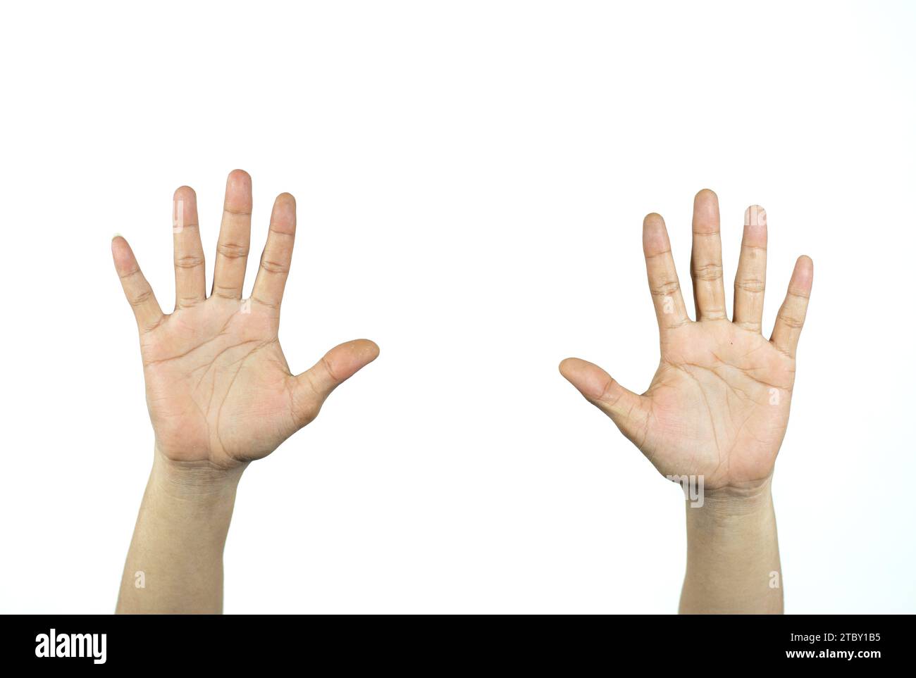two raised men's hands isolated on white background Stock Photo - Alamy