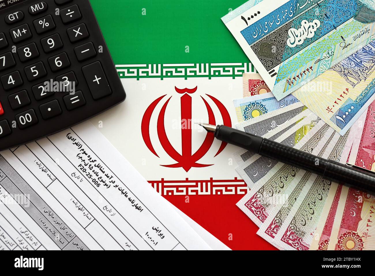 Iranian annual income tax return form F20-25-006 ready to fill on table ...