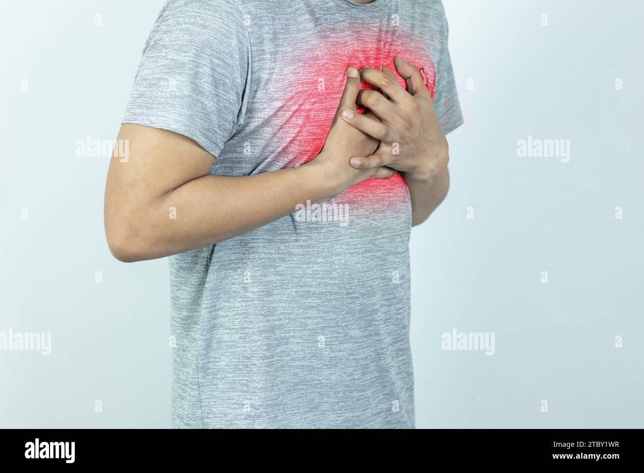 asian man pressing chest with painful expression. Severe heartache ...