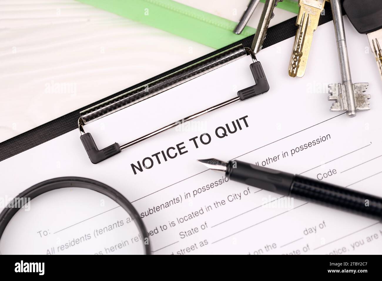 Notice to quit or eviction notice blank on A4 tablet lies on office ...