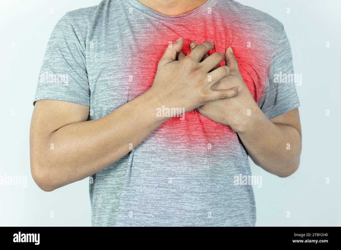 asian man pressing chest with painful expression. Severe heartache ...