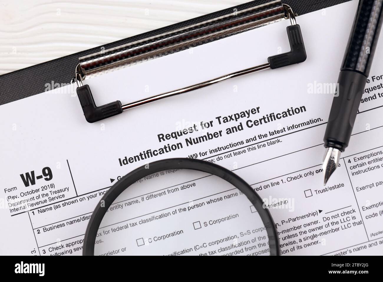 IRS Form W-9 Request for taxpayer identification number and certification, blank on A4 tablet ...