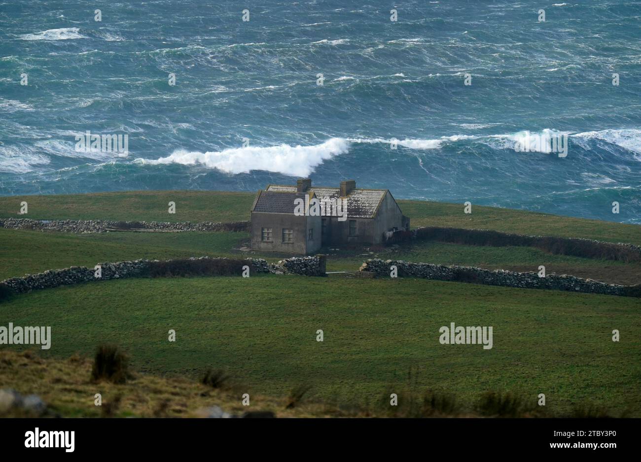 Waves crashing against the shore at Doolin in County Clare on the west ...