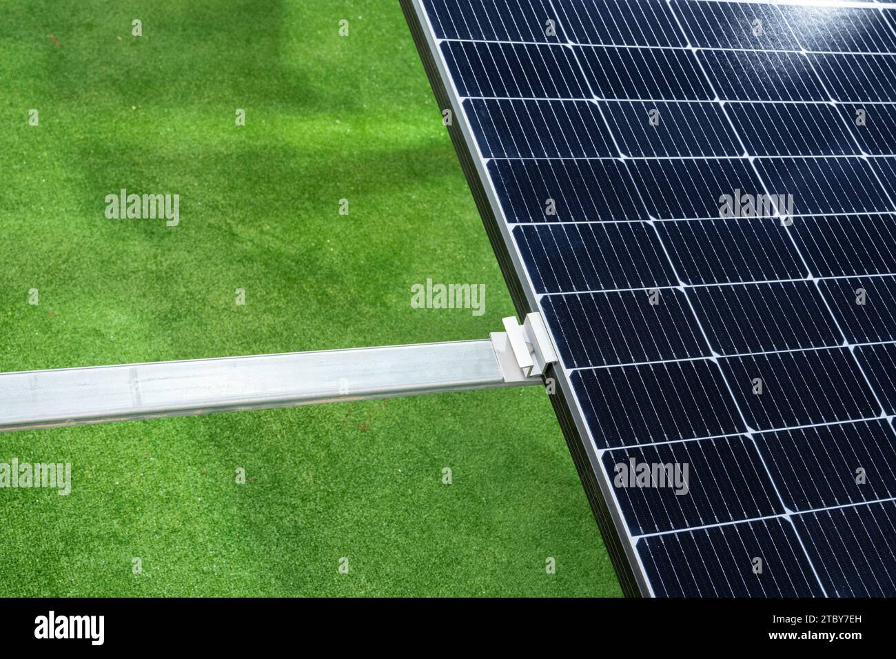 Solar panel on a background of green grass Stock Photo - Alamy