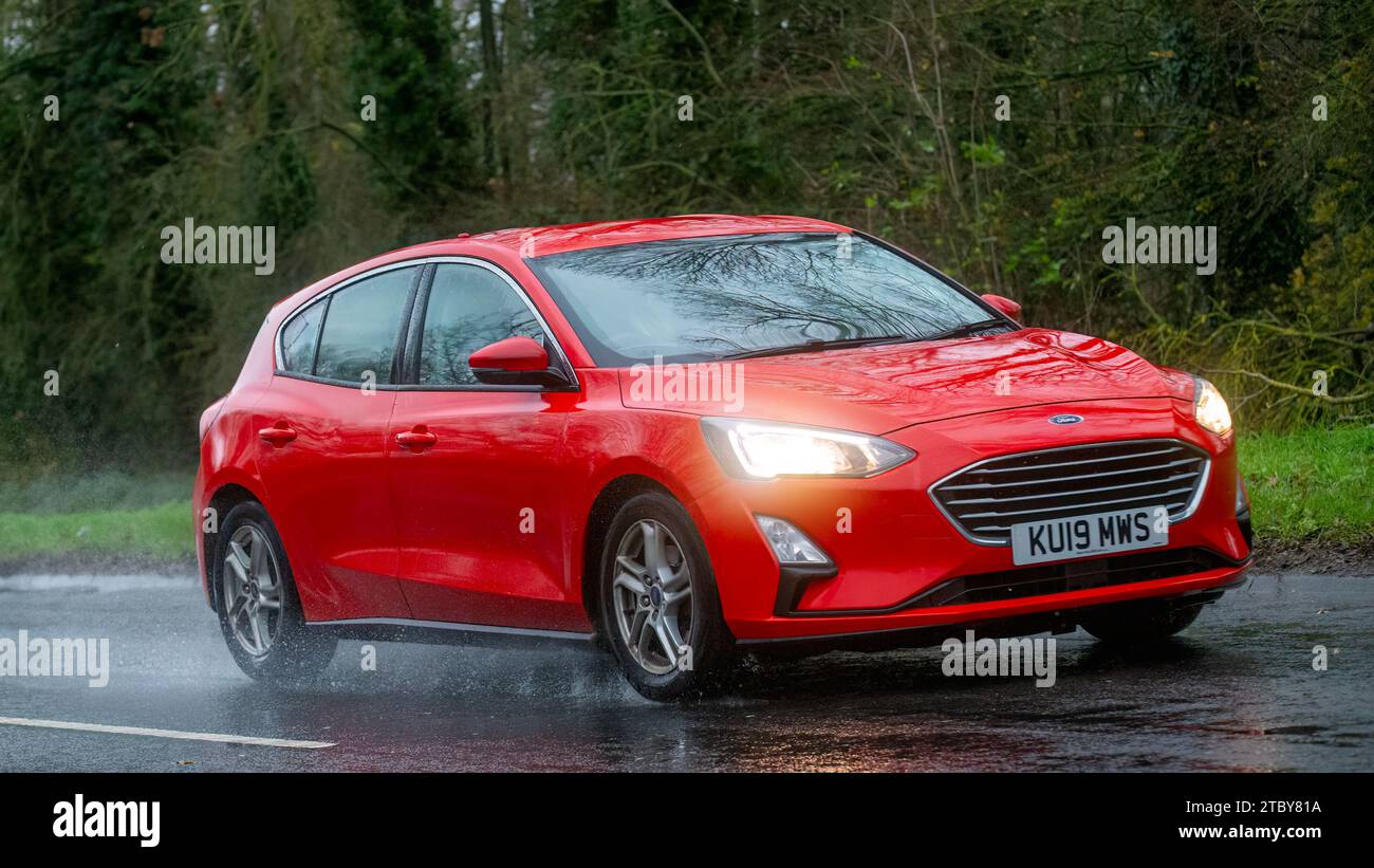Milton Keynes,Bucks,UK - Dec 13th 2023: 2019 red Ford Focus car driving ...