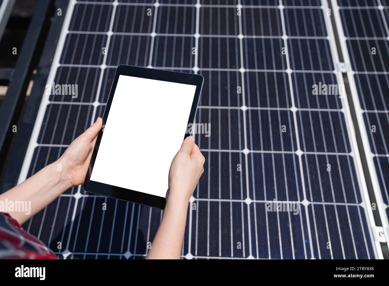 Hands with digital tablet on a background of solar panels Stock Photo ...