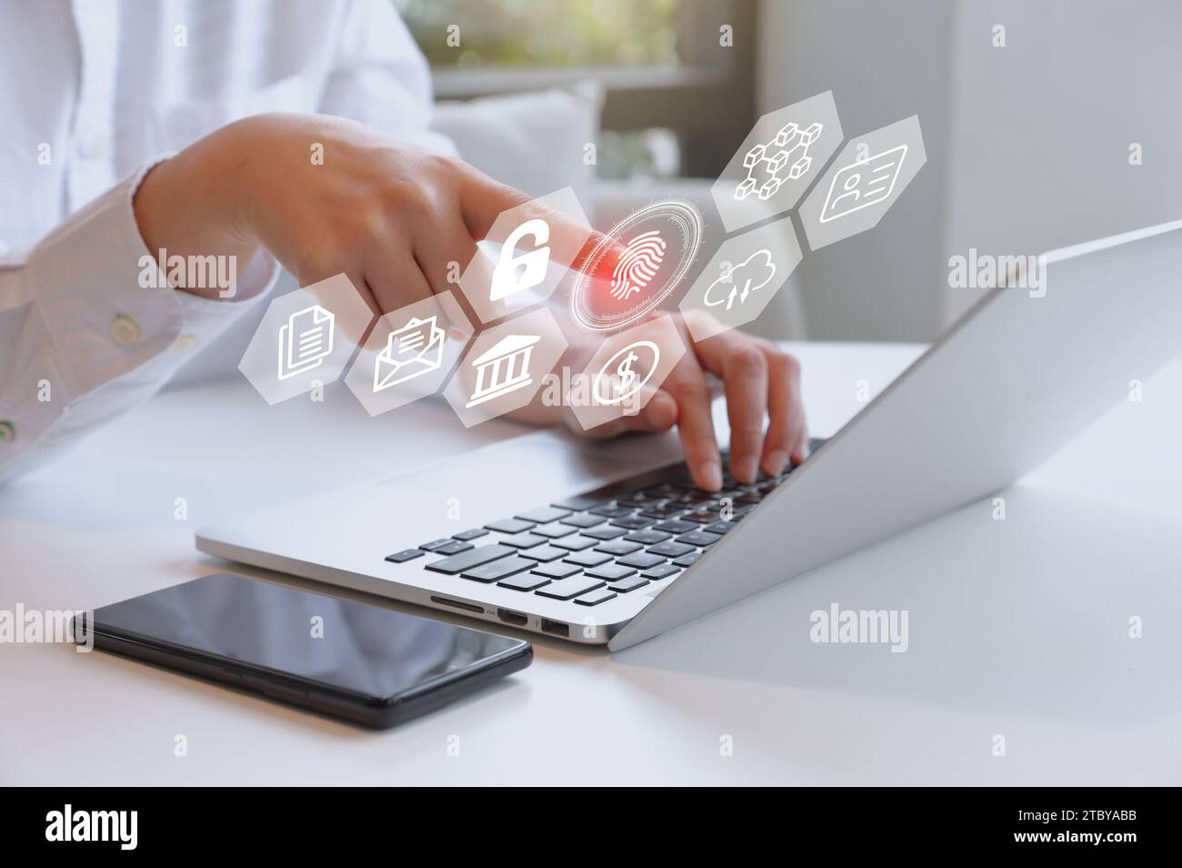Woman unlocking security lock by fingerprint recognition on a ...