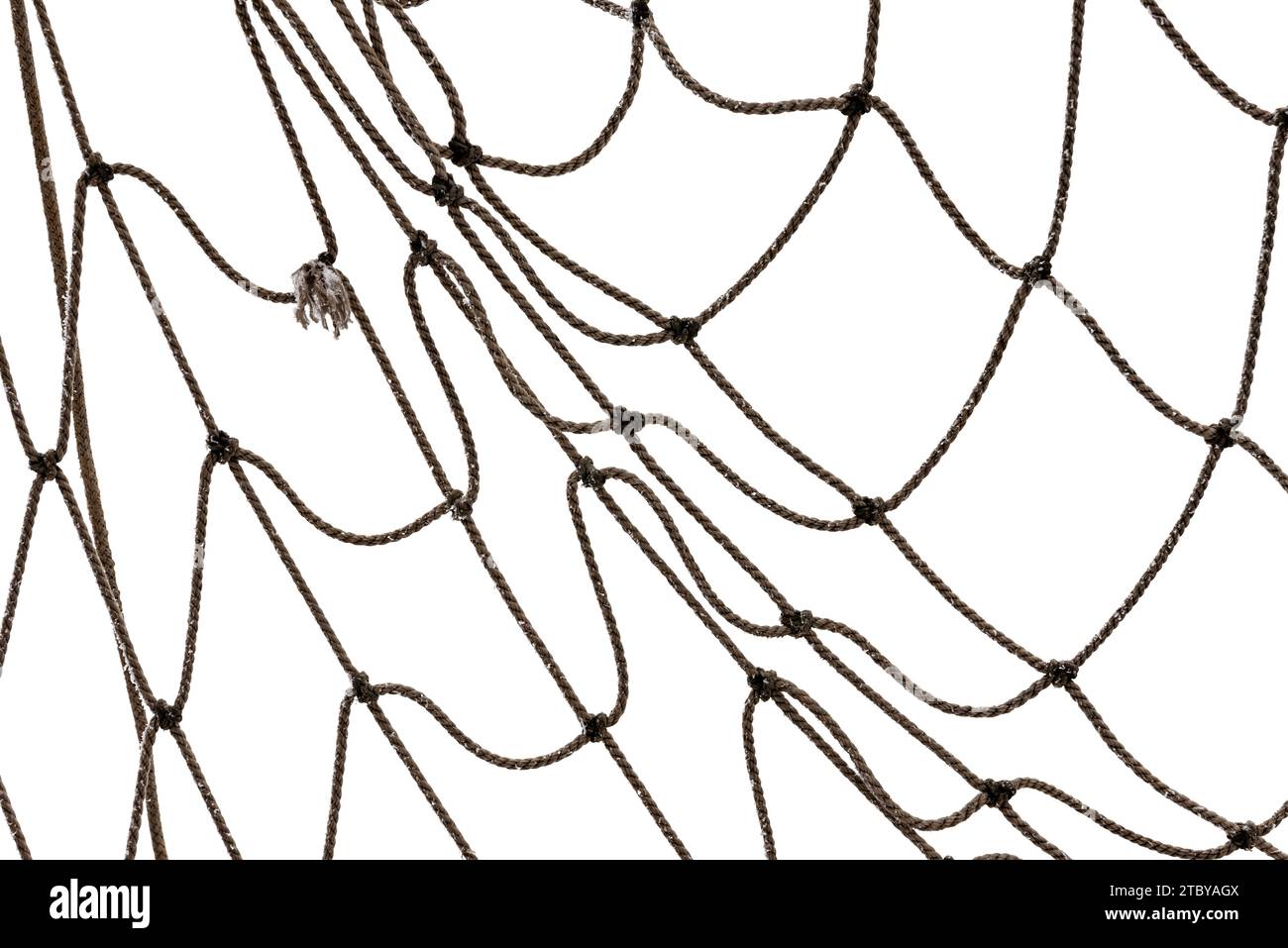 Icy mesh made of rope in the snow on a white background. Torn fishing ...