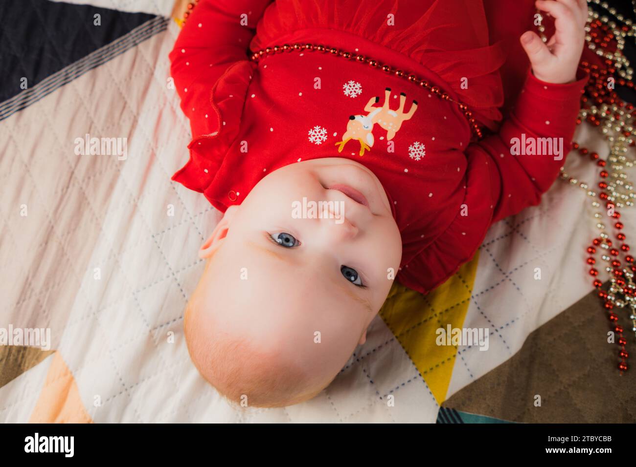 Infant child lying on back hi-res stock photography and images - Alamy