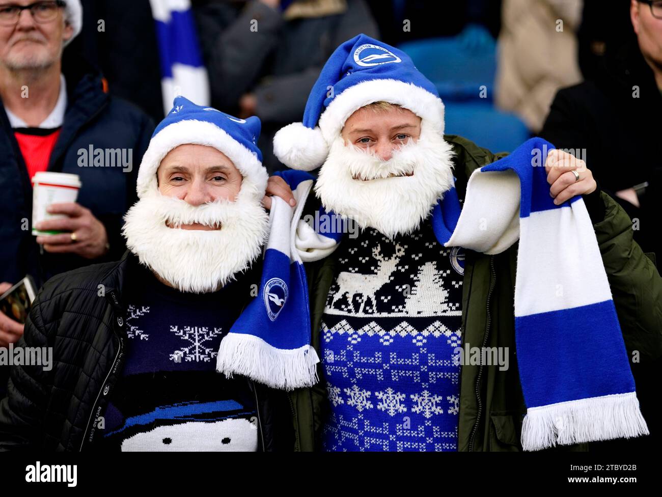 Brighton and Hove Albion fans wearing festive hats ahead of the Premier ...