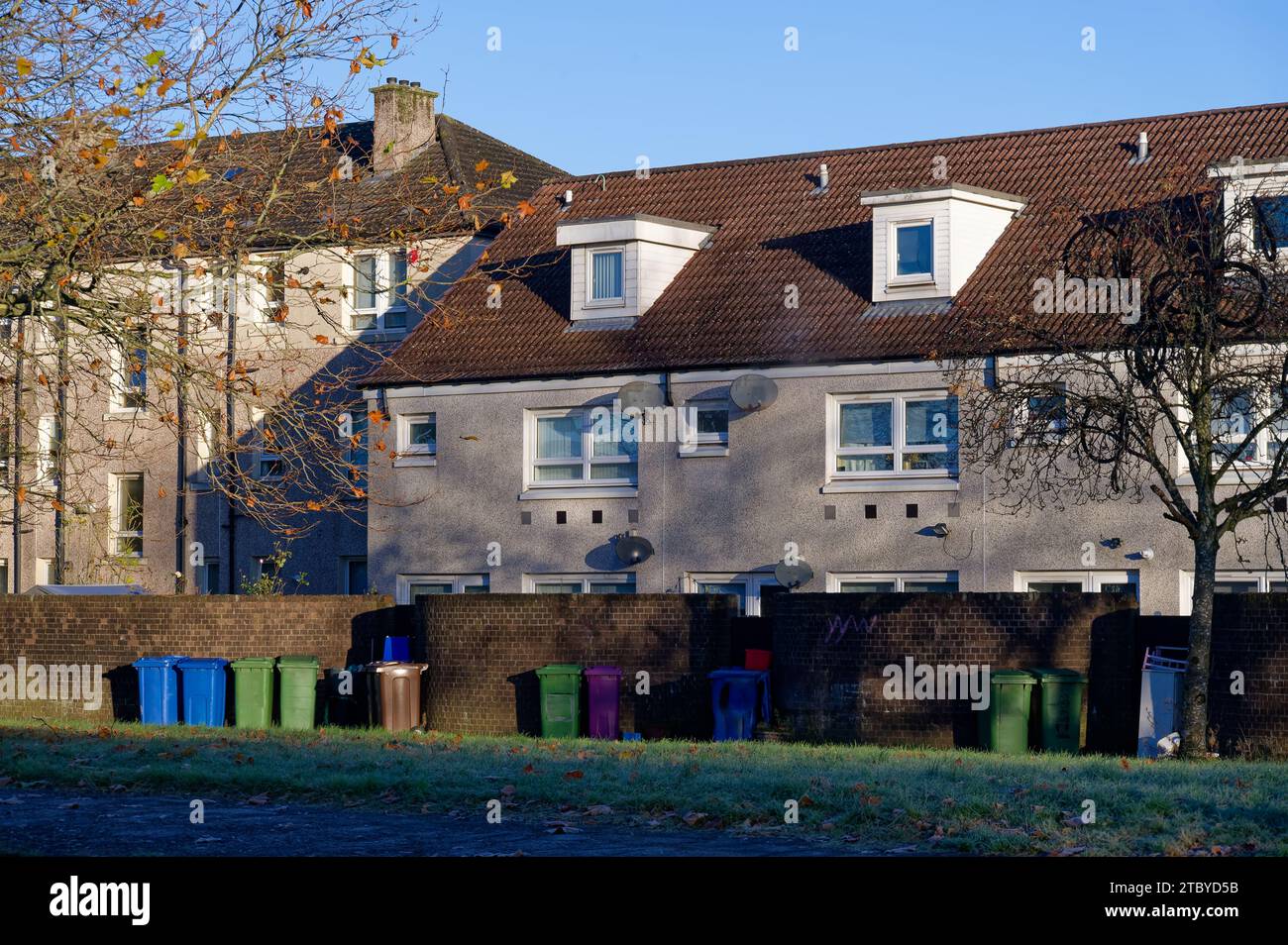 Wheelie bins in row for refuge collection outside council residential ...