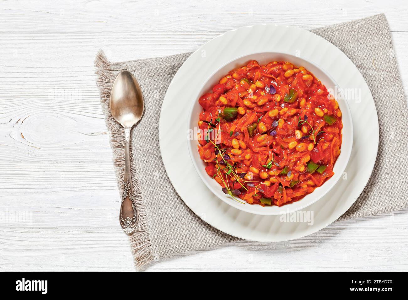 chakalaka, refreshing spicy tomato bean relish in white bowl on white ...