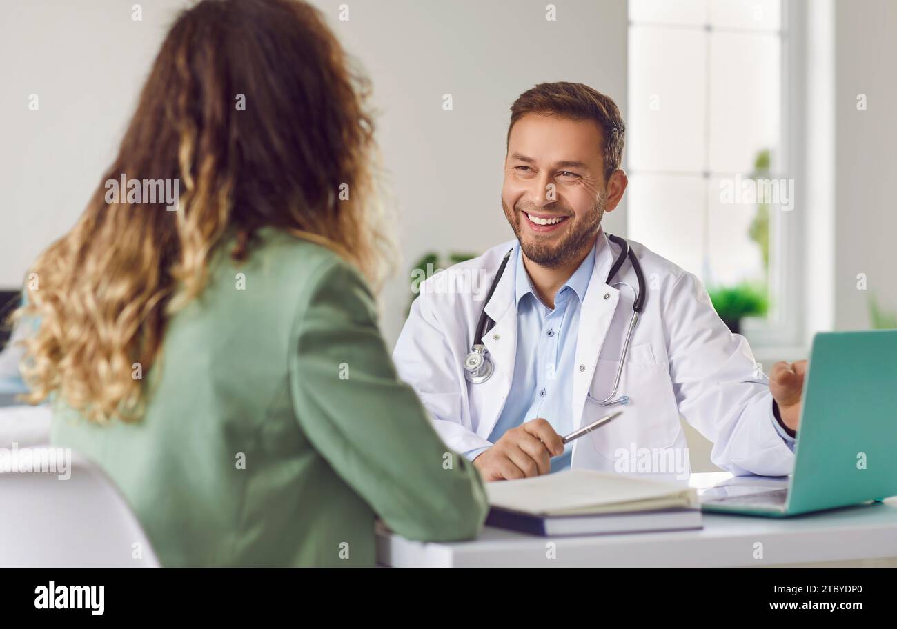 Woman visiting a doctor at the medical office during medical ...