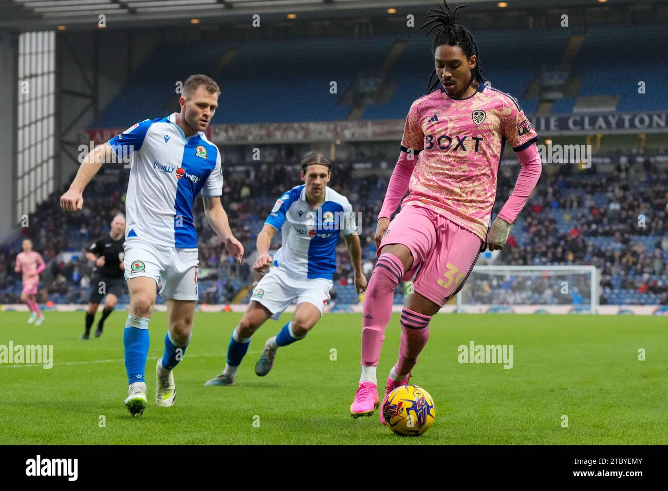 Djed Spence #39 of Leeds United shields the ball from Sondre Tronstad ...