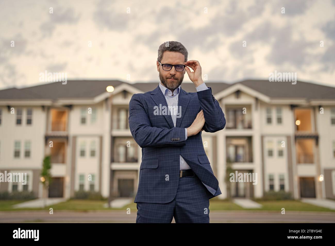 man realtor outdoor. photo of man realtor. man realtor at the house ...