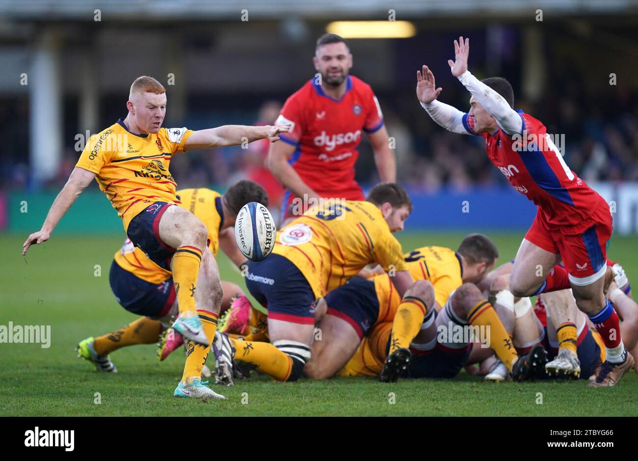 Ulster Rugby's Nathan Doak (left) performs a box kick during the ...