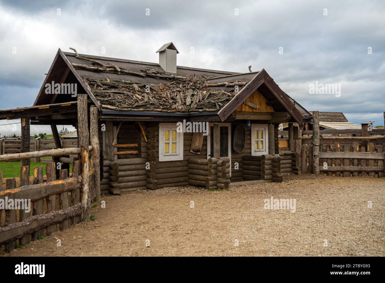 An old village hut made of rustic log house Stock Photo - Alamy