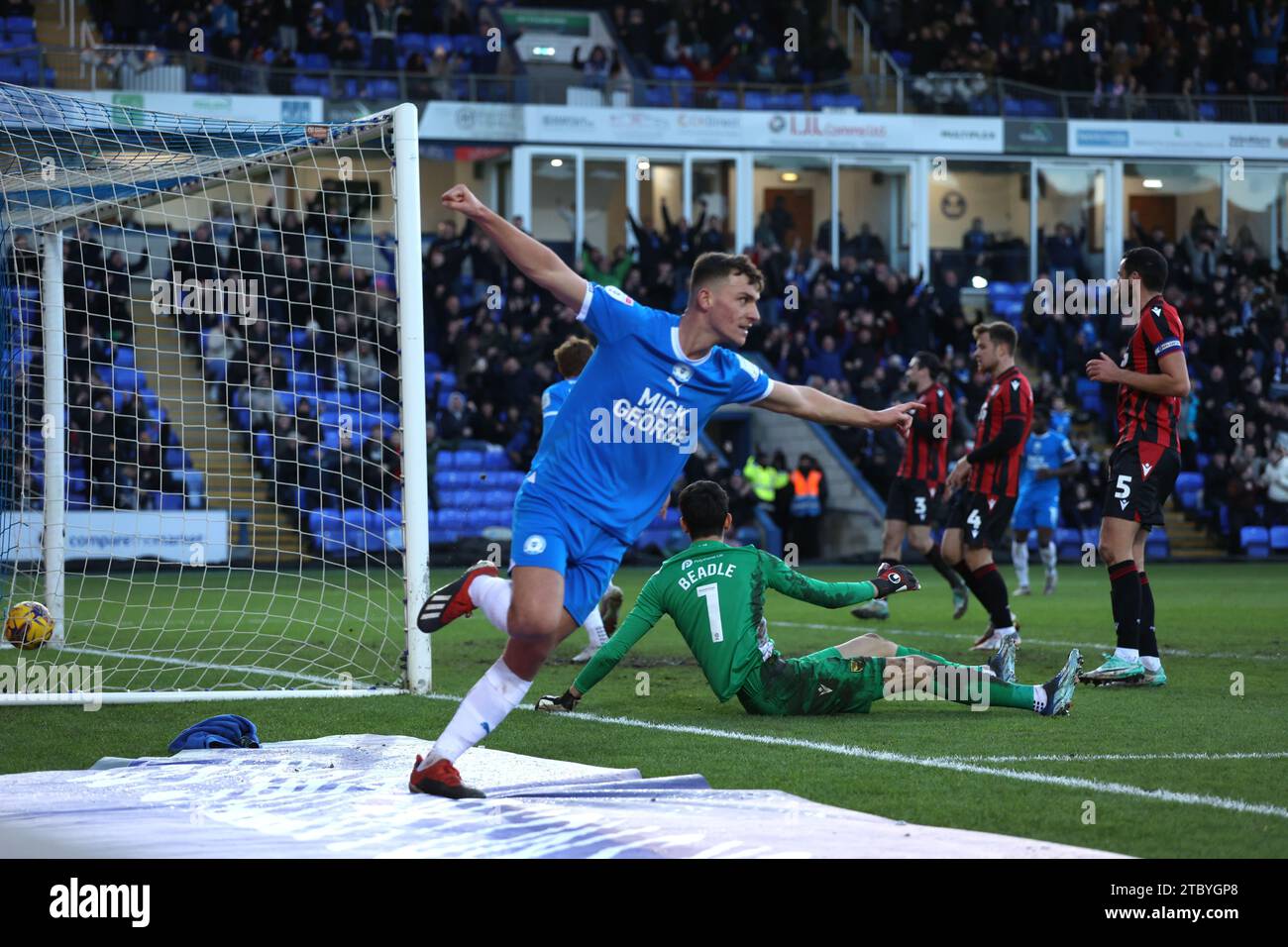 Peterborough, UK. 09th Dec, 2023. Harrison Burrows (PU) celebrates ...