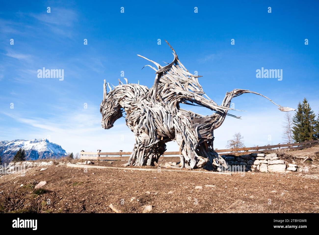 Wooden sculpture of a dragon made of tree branches. Vaia tempest dragon ...