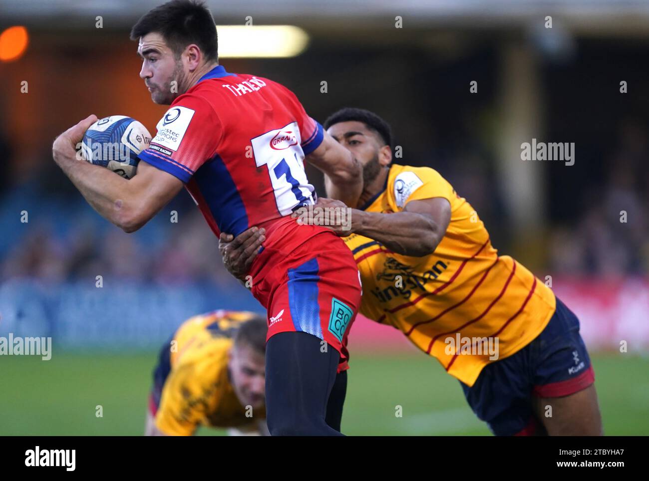 Bath Rugby's Will Muir tackled by Ulster Rugby's Robert Baloucoune ...
