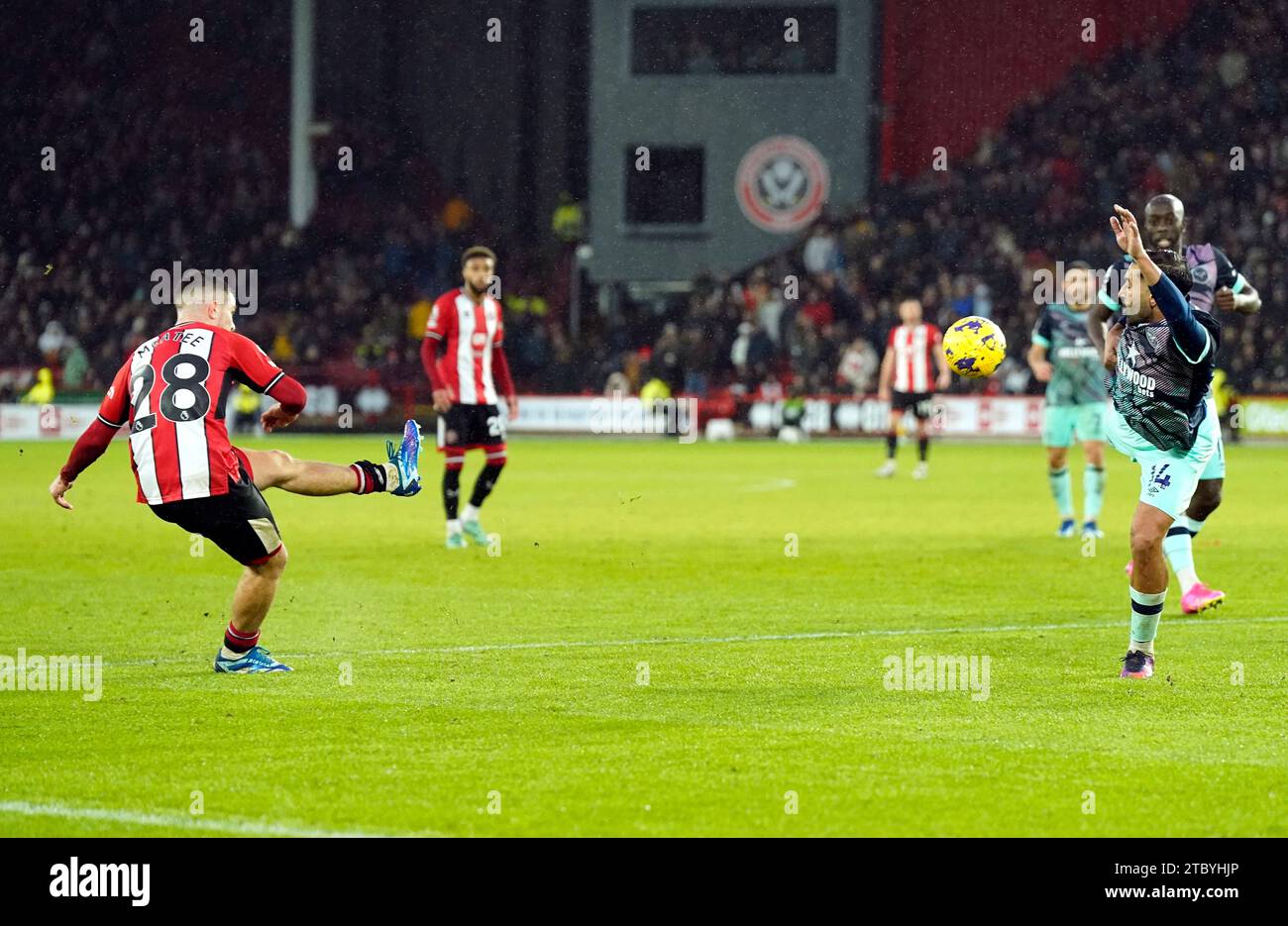Sheffield United's James McAtee (left) scores their side's first goal ...