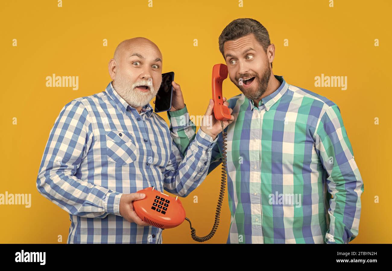 men with telephone contrast call in yellow studio. men with telephone ...