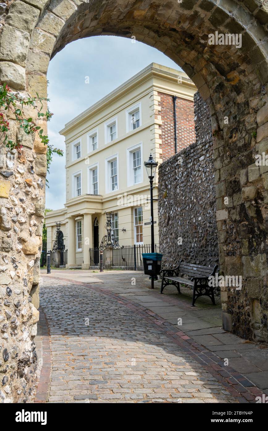 A brick path through the archway of Lewes Castle with the grade II ...