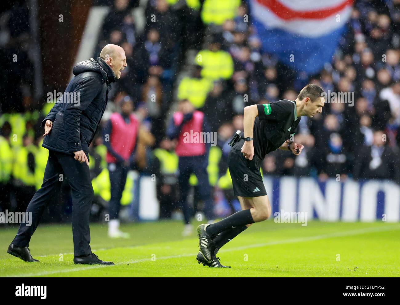 Rangers manager Philippe Clement (left) after being shown a yellow card ...