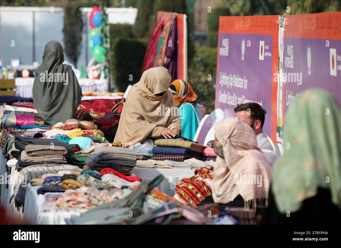 Visitors take keen interest at stalls during ceremony of the 16 Days ...