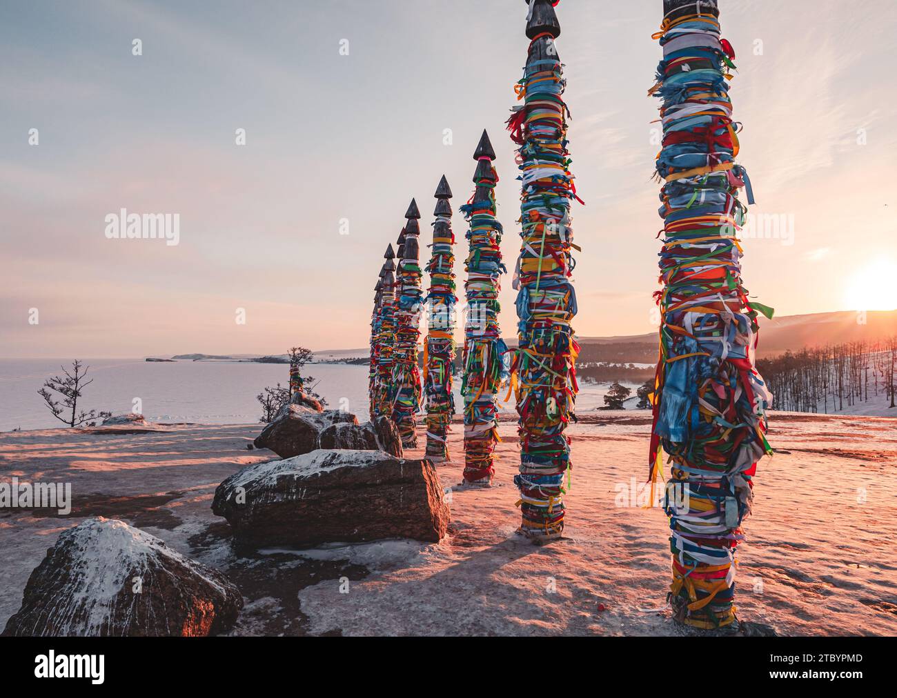 Traditional buryat shaman sacred pillars with colorful ribbons in ...
