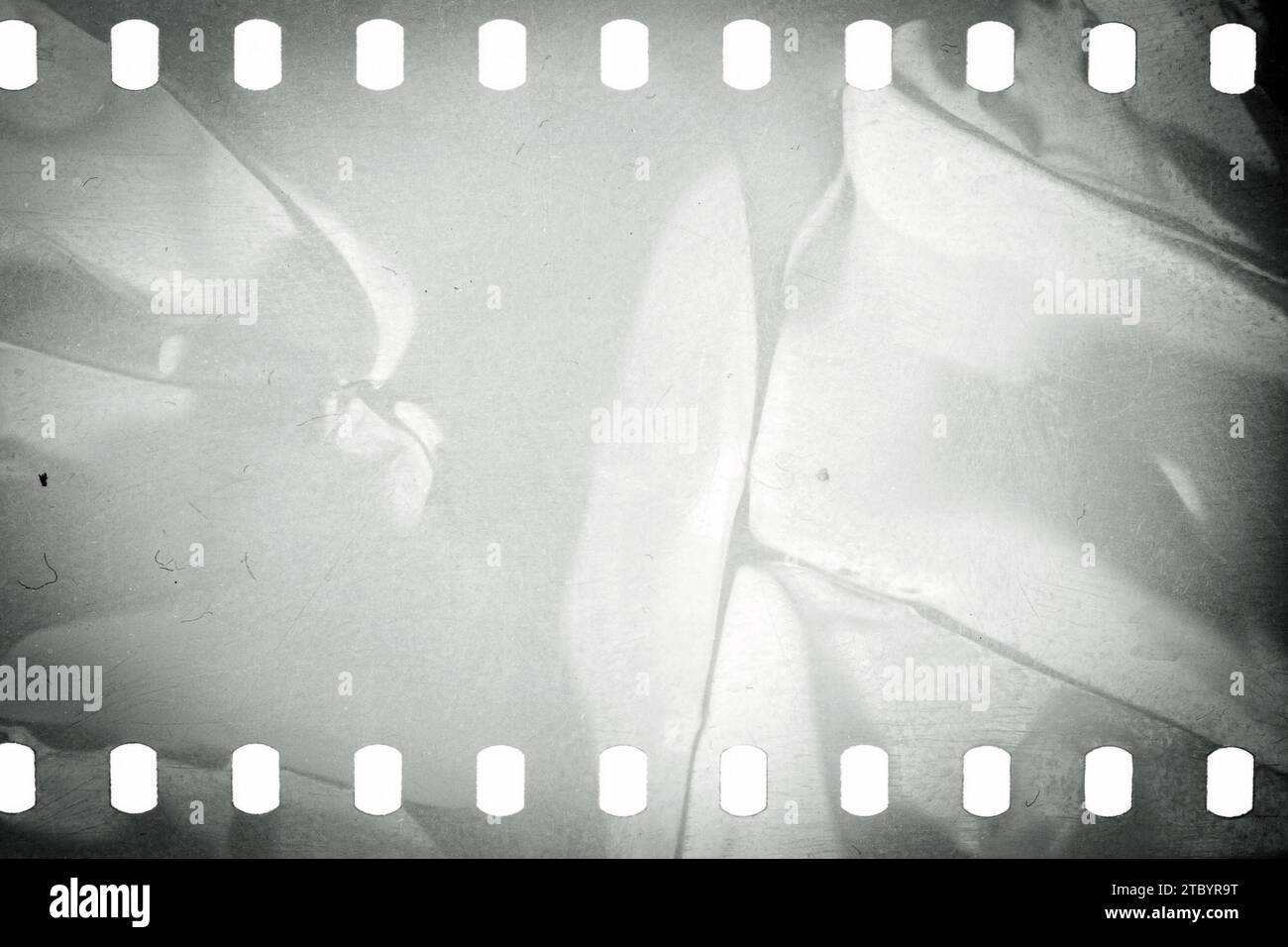 Dusty and grungy 35mm film texture or surface. Perforated scratched ...