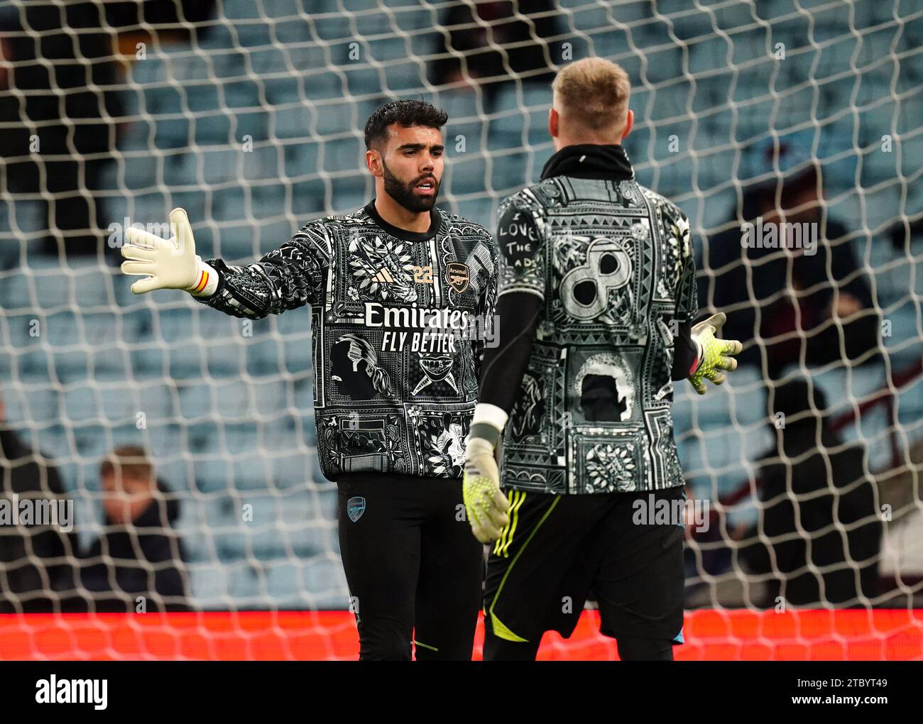 Arsenal goalkeepers David Raya (left) and Aaron Ramsdale warming up ...