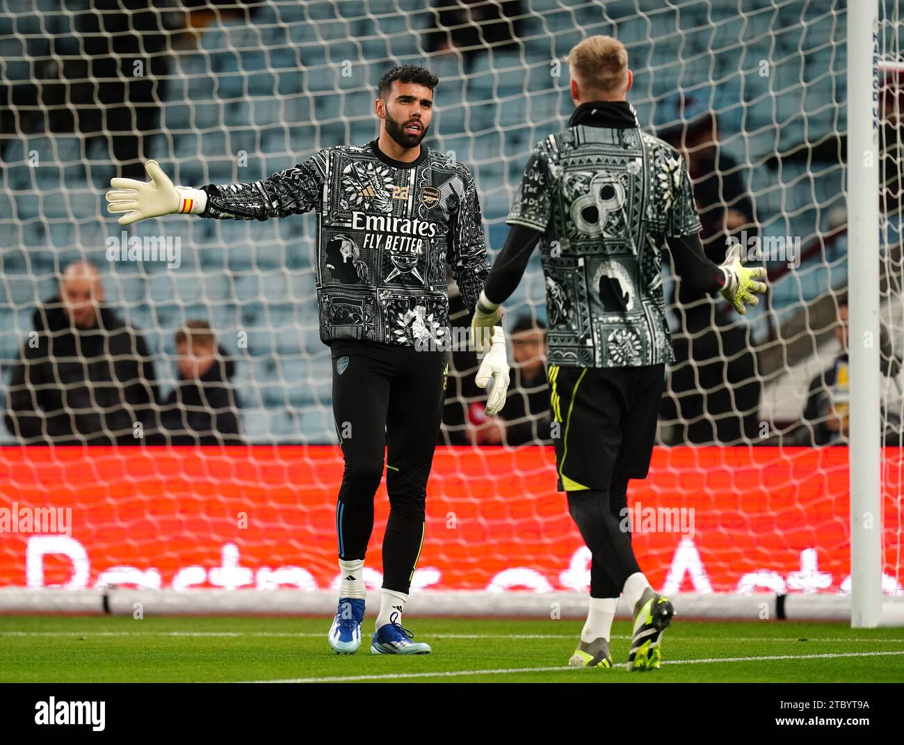 Arsenal goalkeepers David Raya (left) and Aaron Ramsdale warming up ...