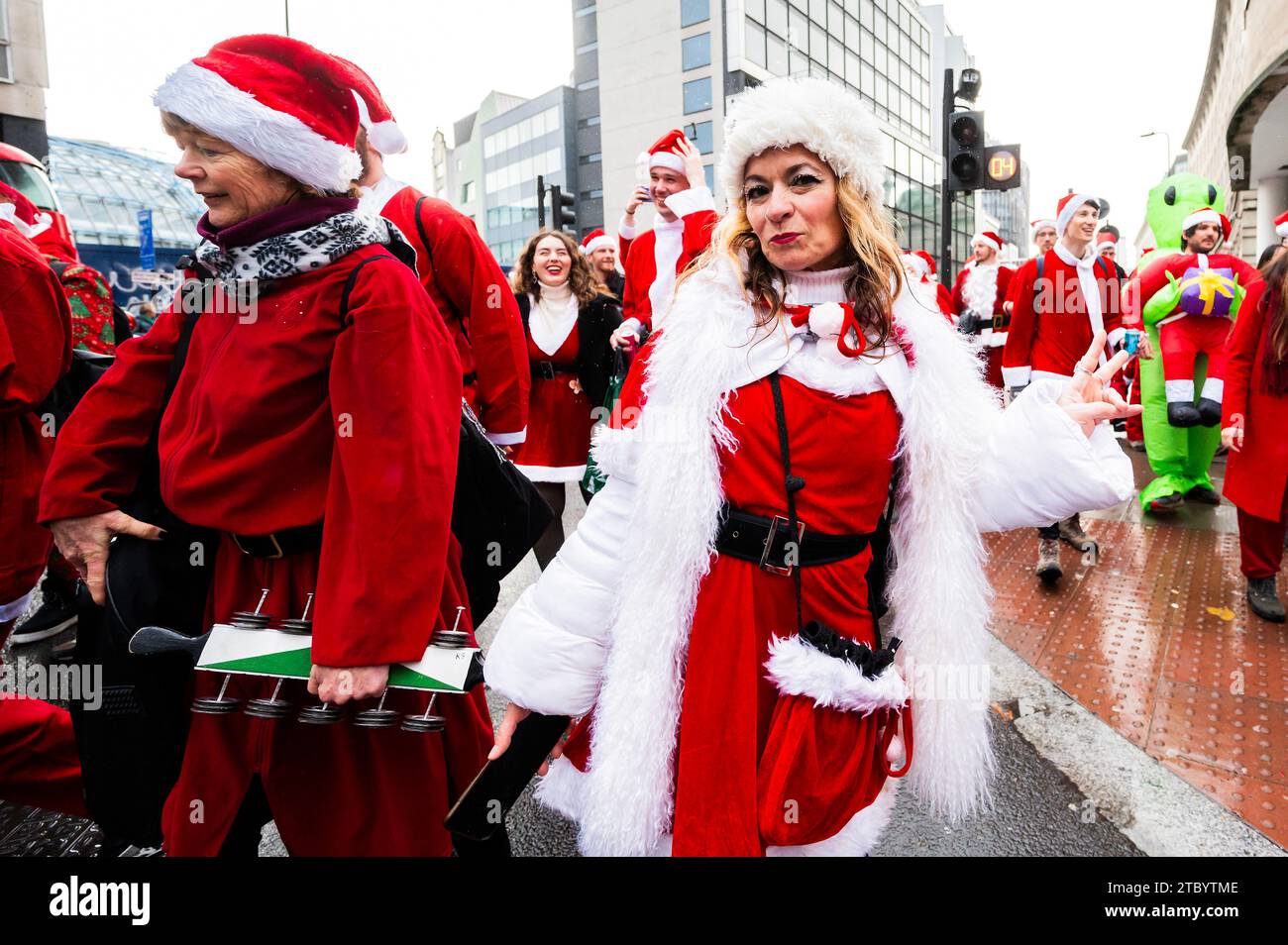 London, UK. 9th Dec, 2023. The Santacon Christmas walk in London. An ...